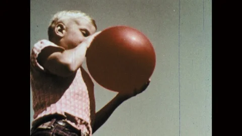 Boy Blowing Up A Balloon Stock Videos – Royalty-Free HD & 4K Videos