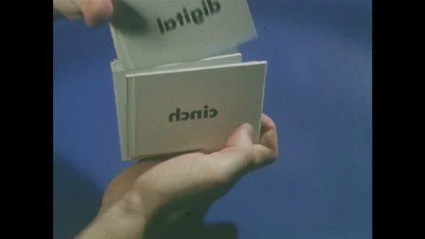 1960s: UNITED STATES: hands shuffle name... | Stock Video | Pond5