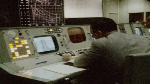 1960s: UNITED STATES: man sits at NASA c... | Stock Video | Pond5
