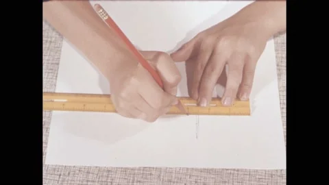 1960s: using ruler to draw straight para... | Stock Video | Pond5
