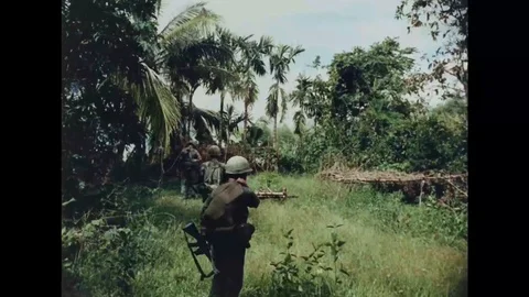 1960s, Vietnam War, US Soldiers walk thr... | Stock Video | Pond5