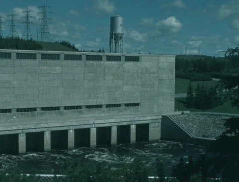 1960s: View of dam, water tower in backg... | Stock Video | Pond5