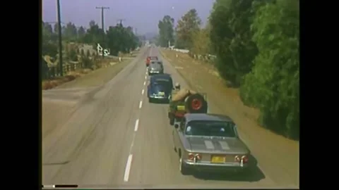 1961 - An old woman gets honked at and a... | Stock Video | Pond5