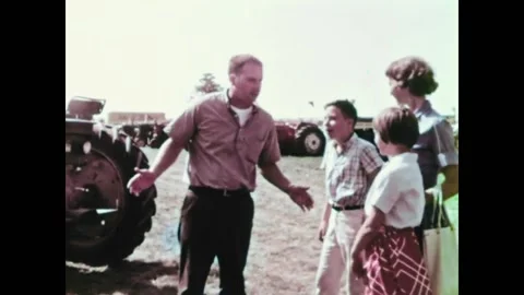 1963 - Kids go to a fairground midway wi... | Stock Video | Pond5