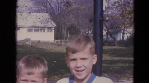 1963: two kids at a park on a sunny day ... | Stock Video | Pond5