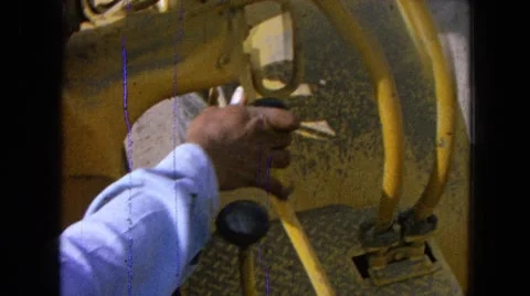 1965: a man using his hand to operate ge... | Stock Video | Pond5