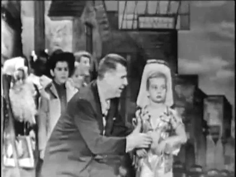 1965- Verna Raymond sings to and tries t... | Stock Video | Pond5