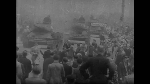 1966 - Tanks drive through city streets | Stock Video | Pond5