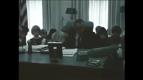 1967 - LBJ poses for pictures with schoo... | Stock Video | Pond5