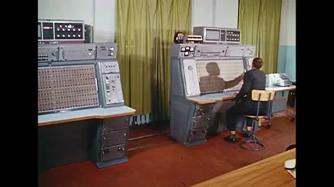 1968 - Men work with computers in a cont... | Stock Video | Pond5