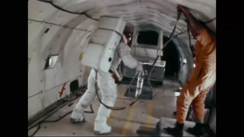 1970 - Astronaut Jim Lovell traverses a ... | Stock Video | Pond5