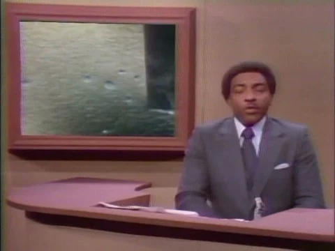 1970s, 1980s- A news anchor discuss the ... | Stock Video | Pond5