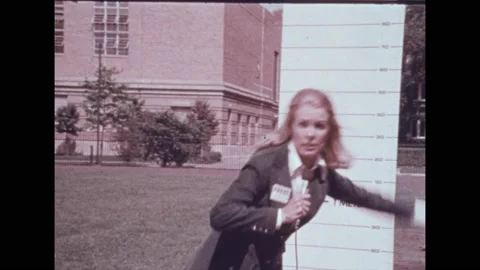 1970s: Blonde lady reporter speaks into ... | Stock Video | Pond5