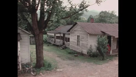1970s: Coal mining. Small run-down house... | Stock Video | Pond5