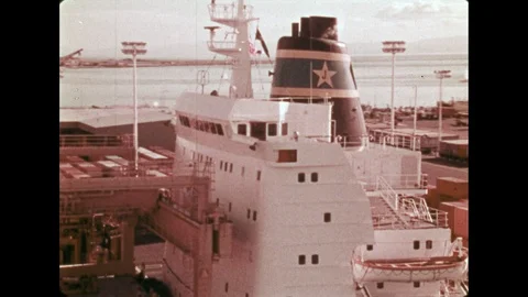 1970s: Cranes and shipping containers on... | Stock Video | Pond5