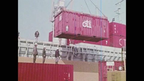 1970s: cranes lift shipping containers o... | Stock Video | Pond5