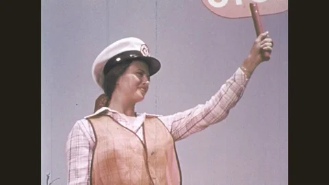 Female Crossing Guard Stock Video Footage | Royalty Free Female ...