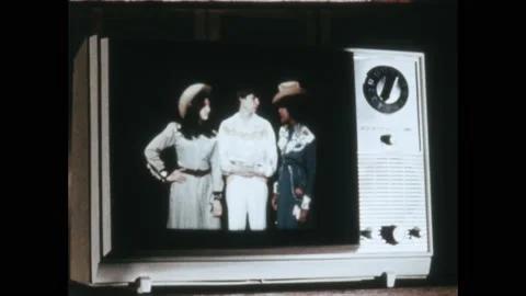 1970s: Image on TV screen, boy talking, ... | Stock Video | Pond5