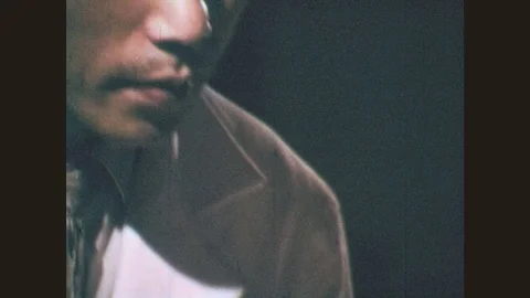 1970s: Man leans down. Machine prints d... | Stock Video | Pond5