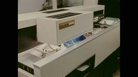 1970s: Man operates processing machine i... | Stock Video | Pond5