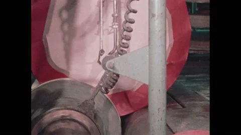 1970s: Men and cranes load rolls of pape... | Stock Video | Pond5