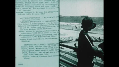 1970s: Pages of the book turned, split-s... | Stock Video | Pond5