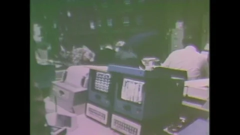 1970s: People in control room. Close up ... | Stock Video | Pond5