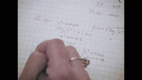 1970s: Person writing math equations on ... | Stock Video | Pond5