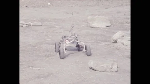 1970s: Rover driving over dirt in rocky ... | Stock Video | Pond5