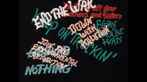 1970s: Slogans. Young man uses spray pai... | Stock Video | Pond5