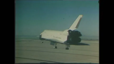 1970s: Space shuttle touches down on run... | Stock Video | Pond5