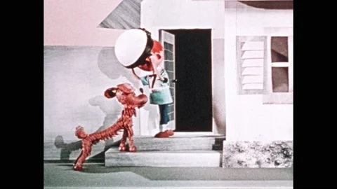 1970s: Stop motion dog walks out of fron... | Stock Video | Pond5