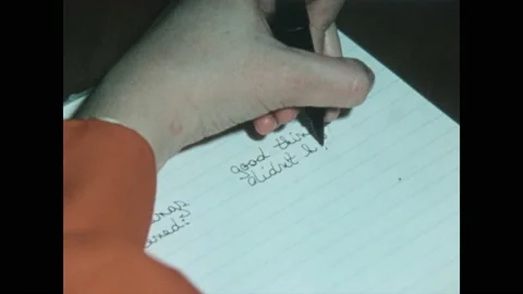 1970s: Student is writing in cursive on ... | Stock Video | Pond5