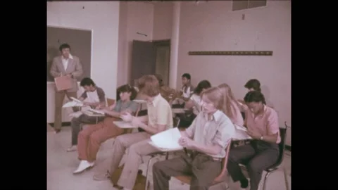 1970s: Students at desks in classroom. L... | Stock Video | Pond5