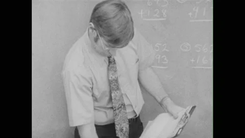 1970s: Teacher sets expectations at fron... | Stock Video | Pond5