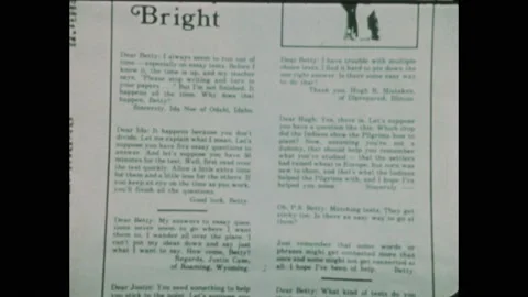 1970s: Tilt up page in magazine. Girl wr... | Stock Video | Pond5