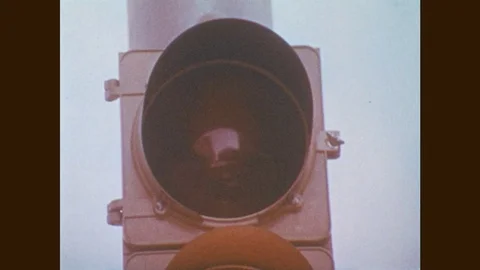 1970s: Traffic light flashes red, yellow... | Stock Video | Pond5