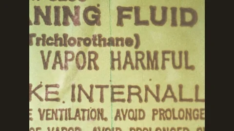 1970s: Warning labels. Hand dials number... | Stock Video | Pond5