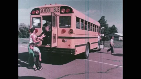 1970s: Woman stands at the rear door of ... | Stock Video | Pond5