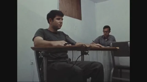 1972 - An American soldier answers quest... | Stock Video | Pond5