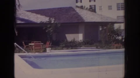 1973: viewing of a quiet swimming pool. ... | Stock Video | Pond5
