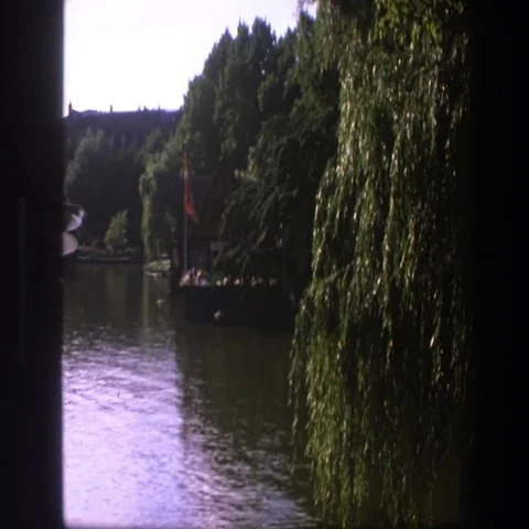 1975: a red flag flying in the air while... | Stock Video | Pond5