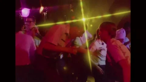 1980 - Men and women dance at a disco pa... | Stock Video | Pond5