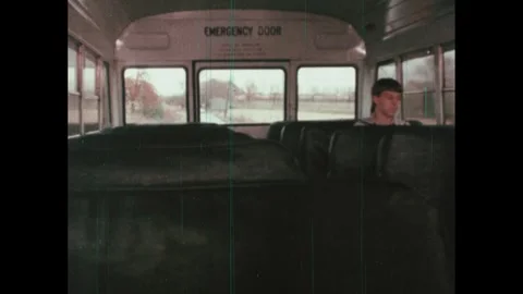 1980s: Children stand and exit bus. Bus ... | Stock Video | Pond5