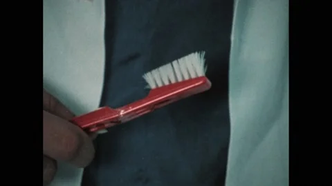 1980s: Dentist demonstrates proper brush... | Stock Video | Pond5