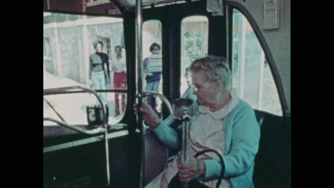 1980s: Elderly woman riding bus. Bus doo... | Stock Video | Pond5