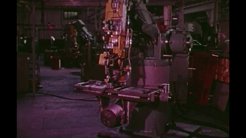 1980s: industrial robotic arm in factor... | Stock Video | Pond5