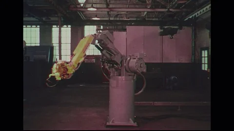 1980s: industrial robotic arm shows ran... | Stock Video | Pond5