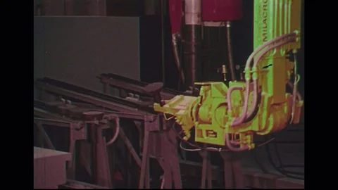 1980s: industrial robotic arm works at ... | Stock Video | Pond5