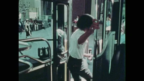 1980s: Man standing at bus entrance. Bus... | Stock Video | Pond5